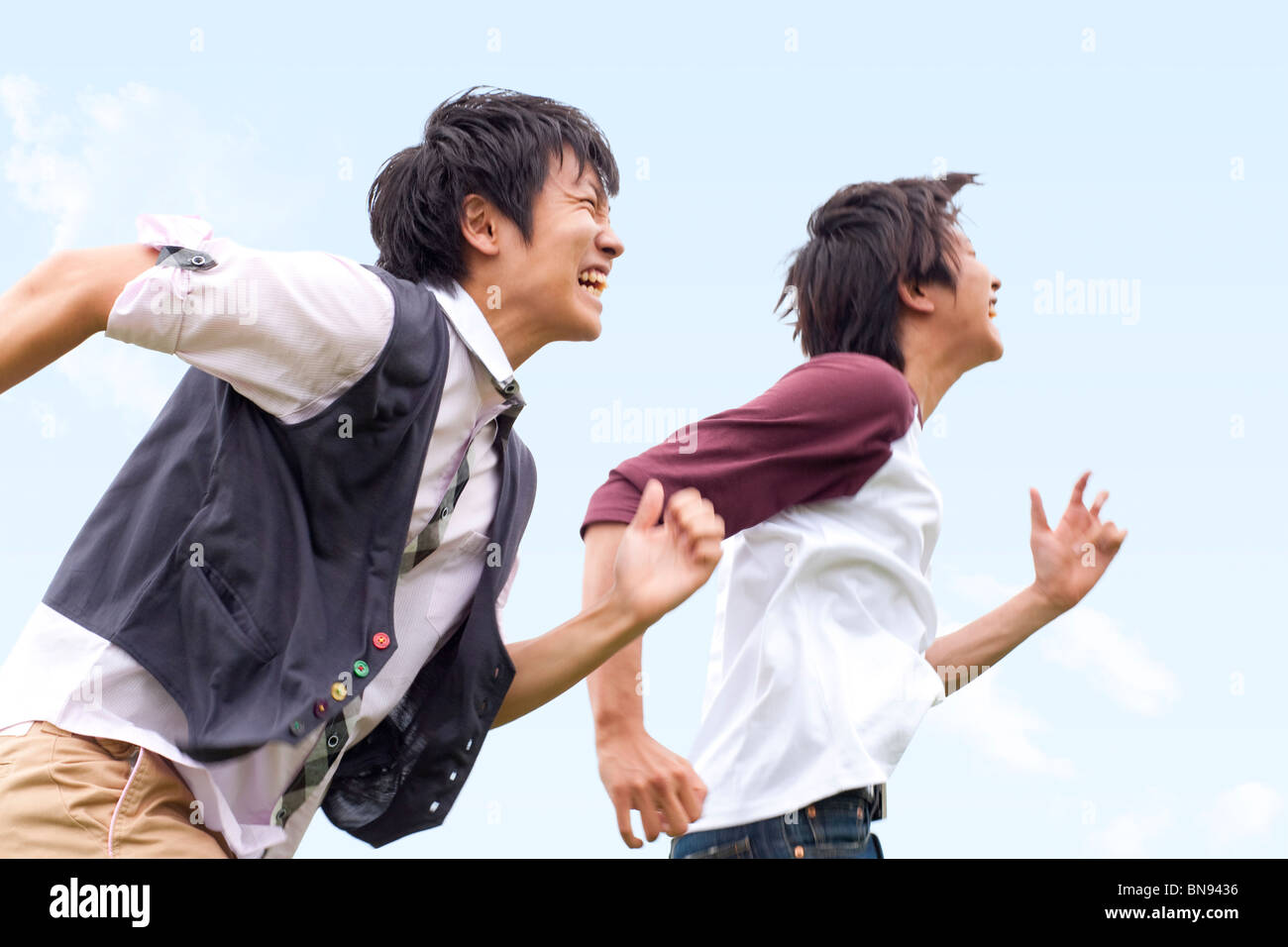 Two friends compete in hi-res stock photography and images - Alamy
