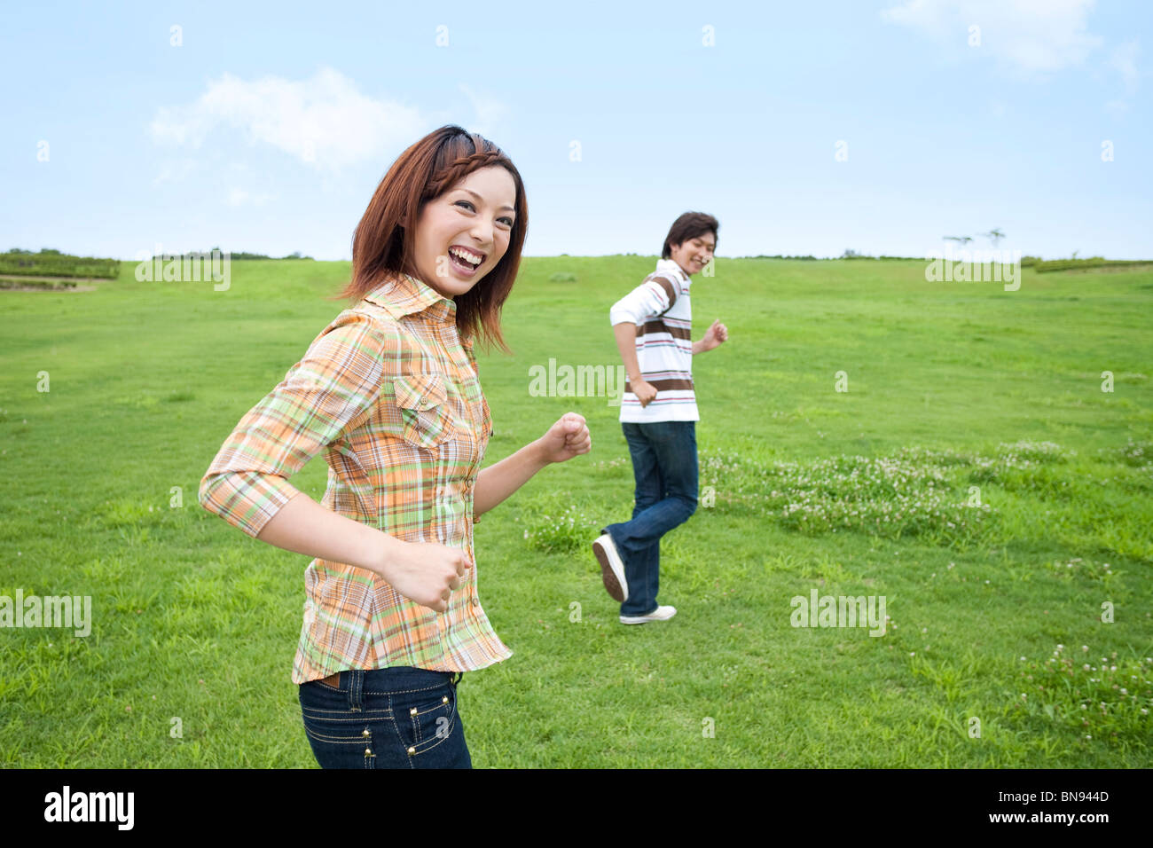 Young woman turning around hi-res stock photography and images - Alamy