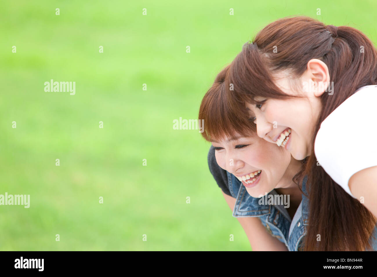 Two Young Women Cuddling Stock Photo - Alamy Two Young Women Cuddling Stock Photo - Alamy