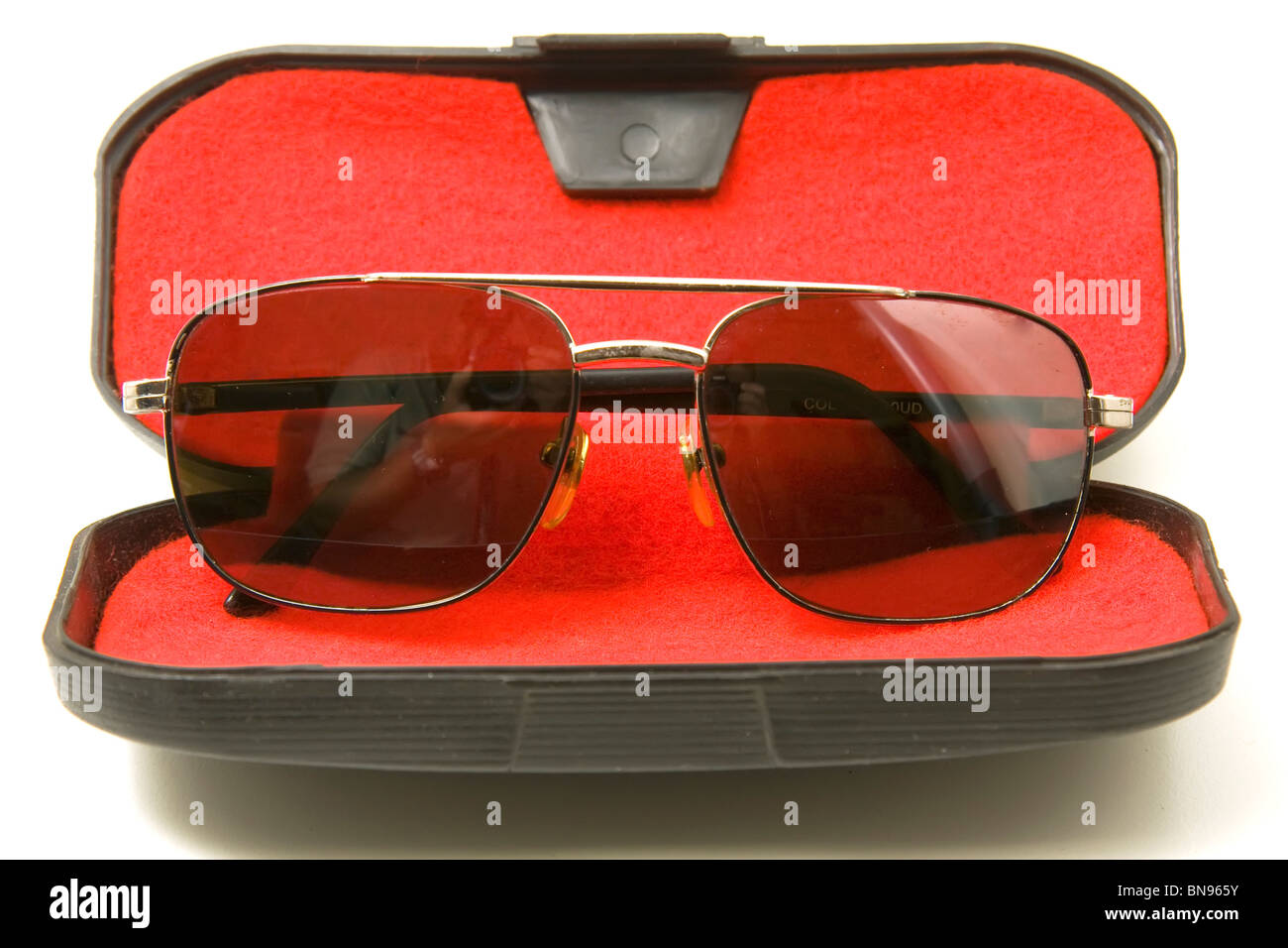 Sunglasses in plastic box lined with red velveteen Stock Photo - Alamy