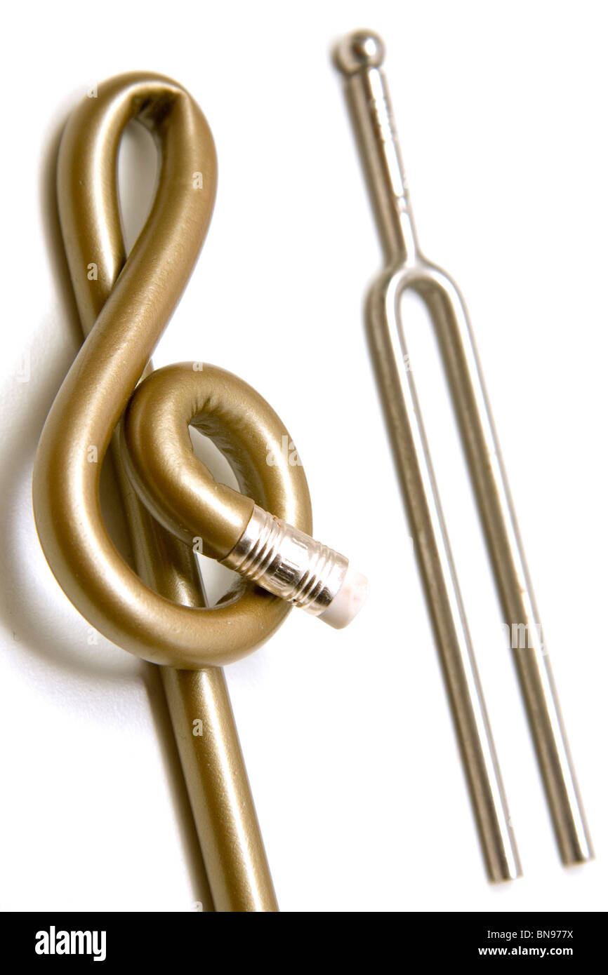 Treble clef and tuning fork Stock Photo - Alamy