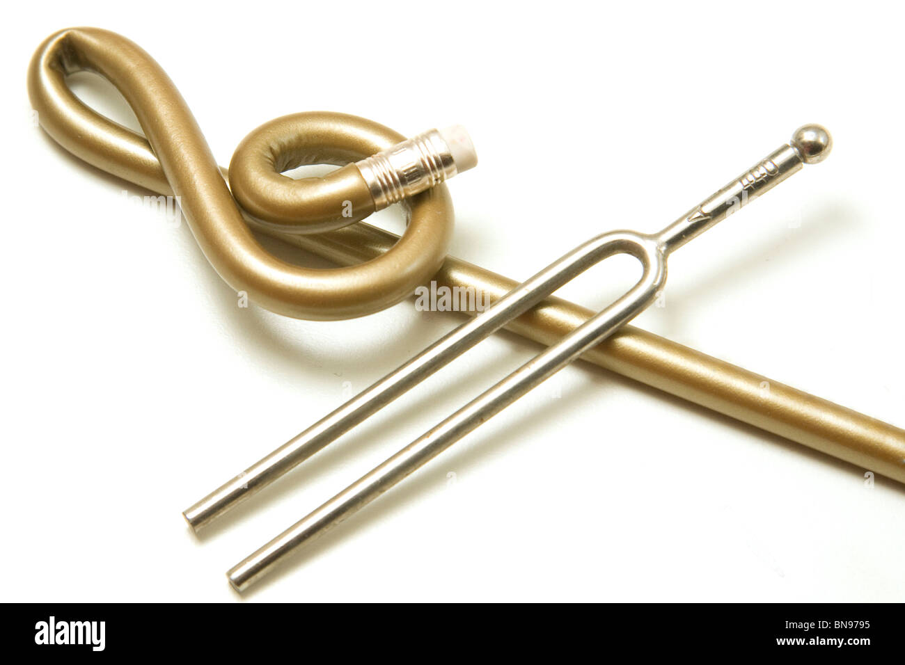 Treble clef and tuning fork Stock Photo - Alamy