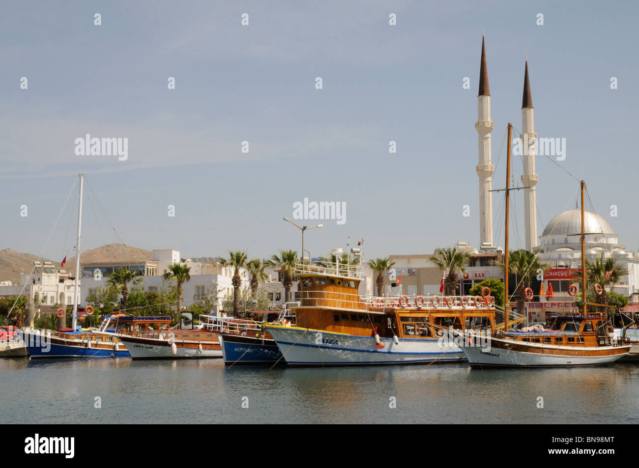 Turkish Mosque overlooks the harbour in the coastal resort & port of ...