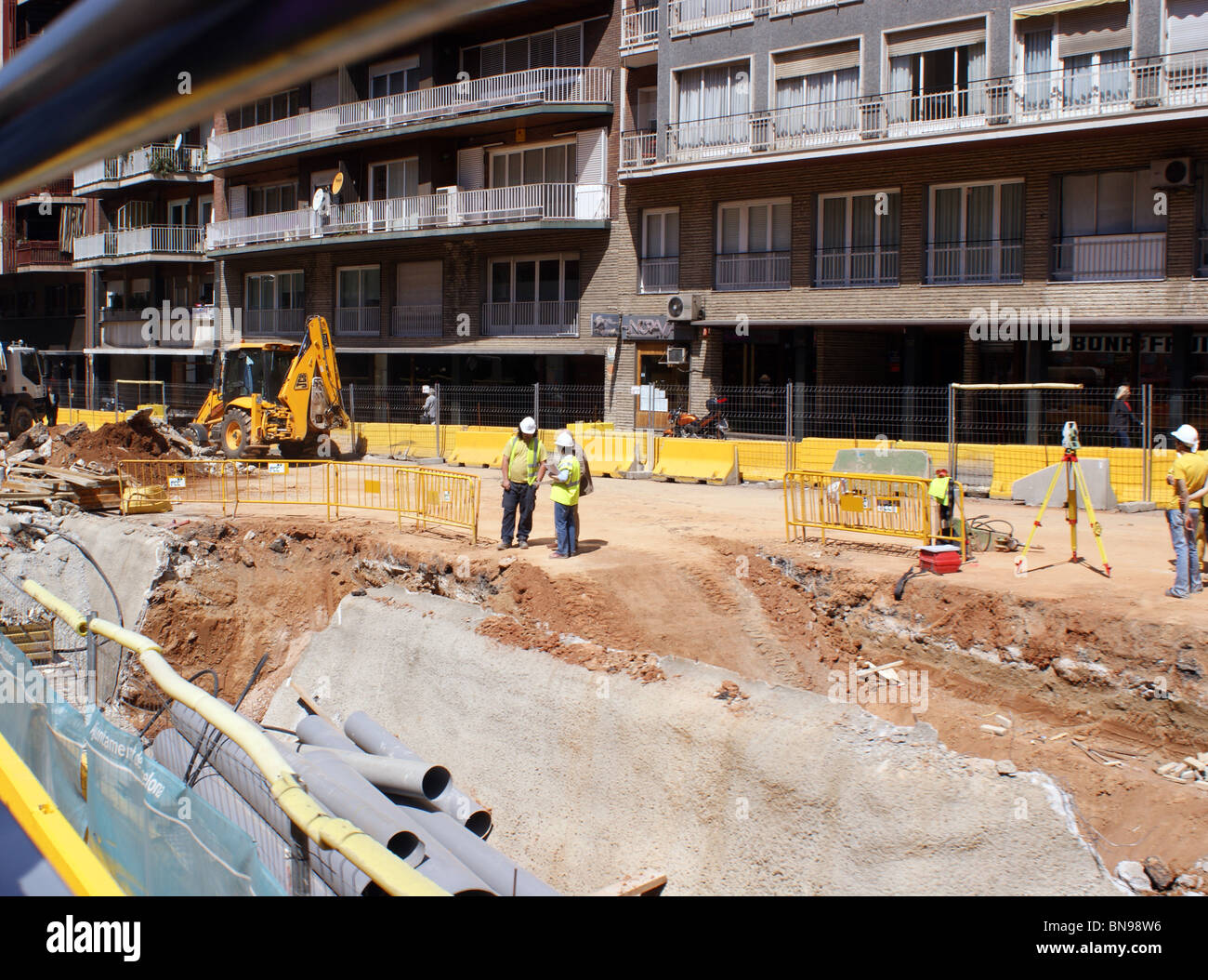BUILDING WORK TAKING PLACE ON A BARCELONA STREET Stock Photo - Alamy