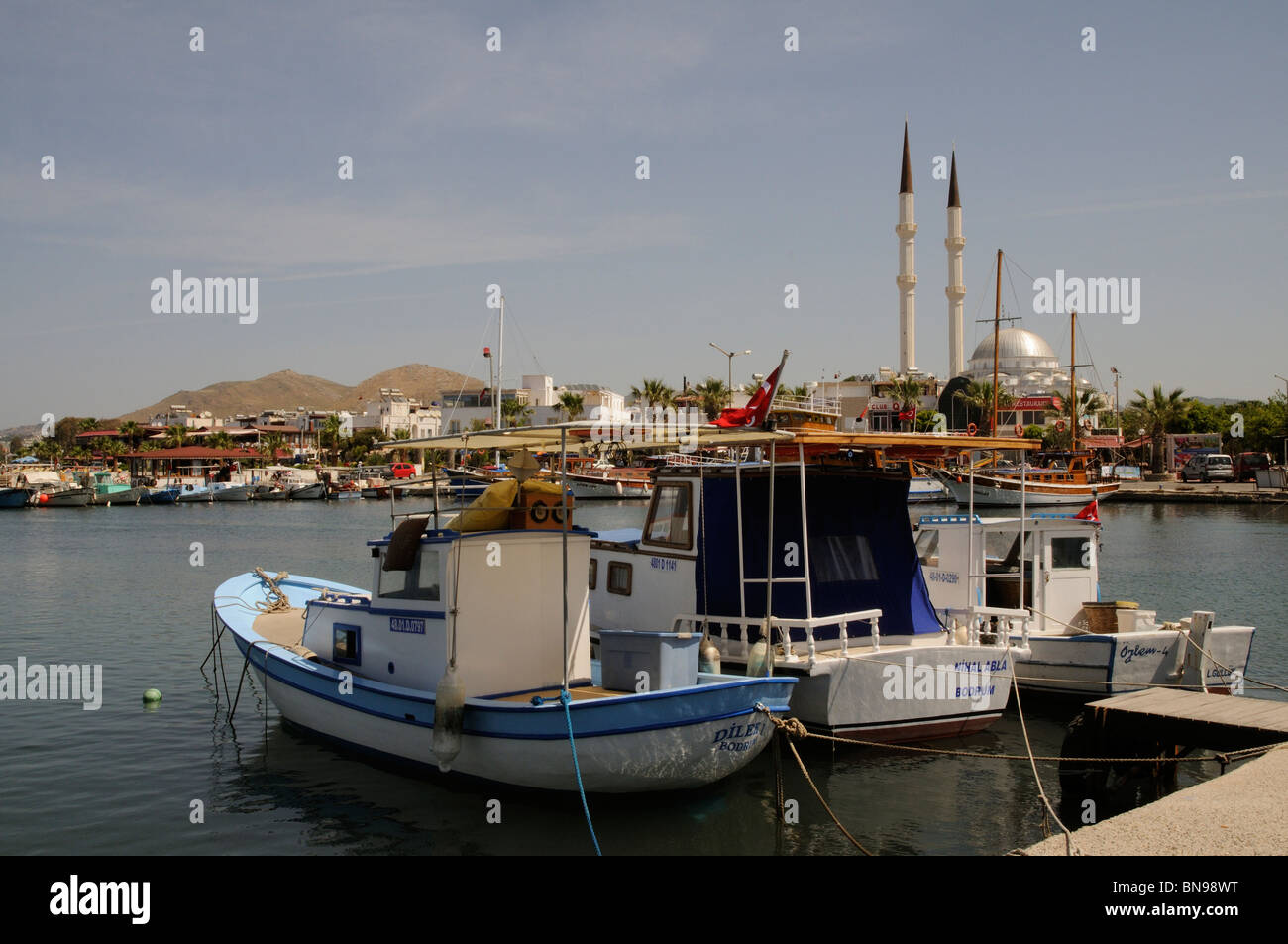 Turkish Mosque overlooks the harbour in the coastal resort & port of ...