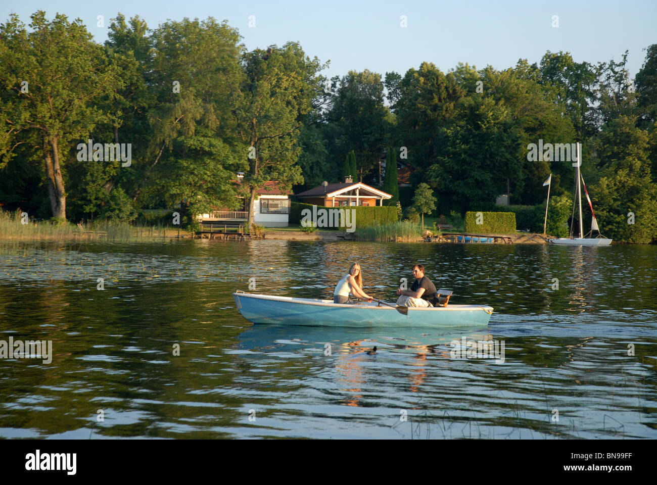 Romantic couple in rowing boat hi-res stock photography and images - Alamy