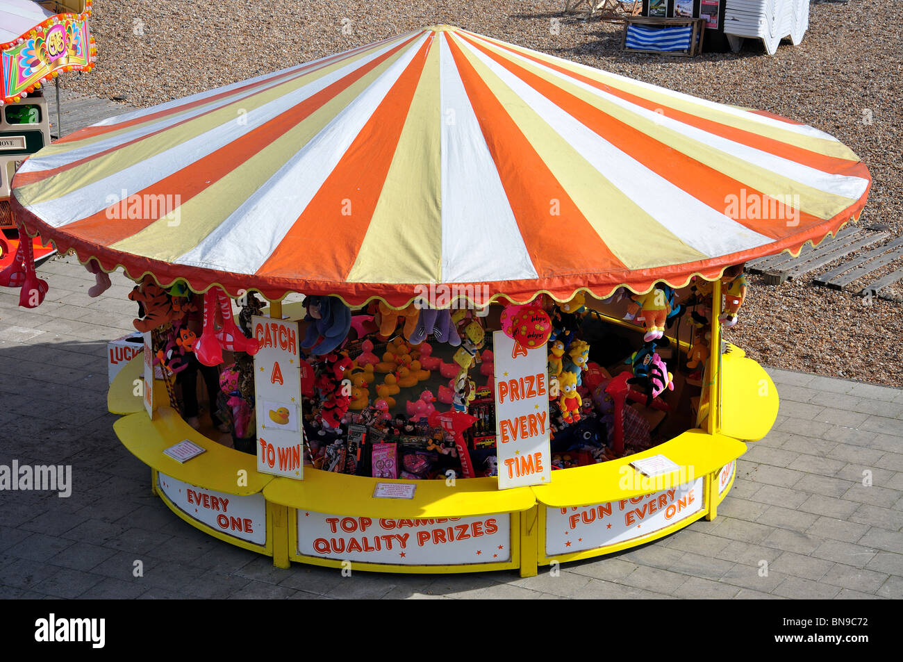 Fairground game stall on beachfront, Brighton, East Sussex, England ...