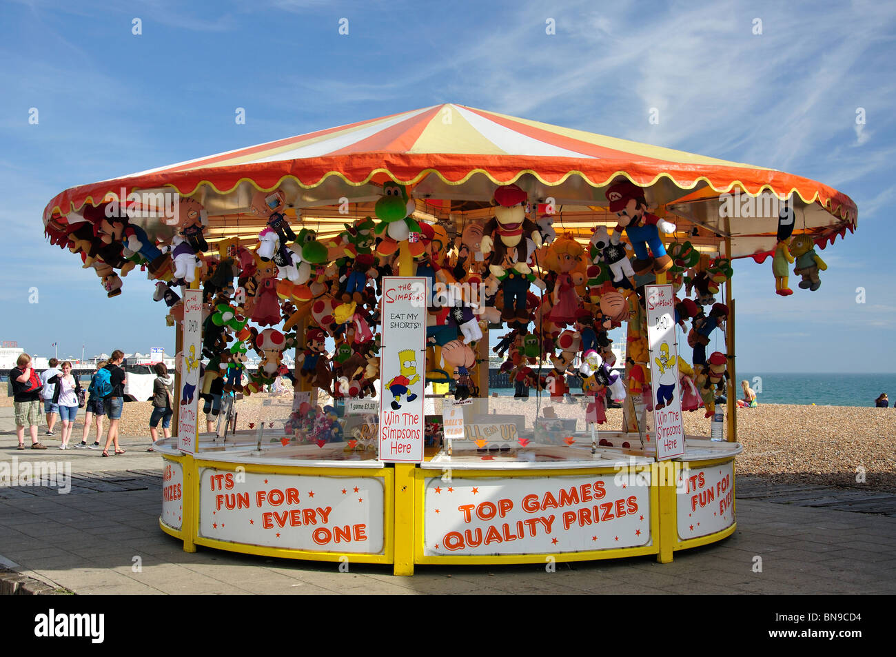 Fairground game stall on beachfront, Brighton, East Sussex, England ...