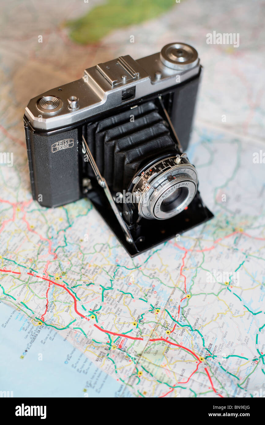 Map and camera Stock Photo - Alamy