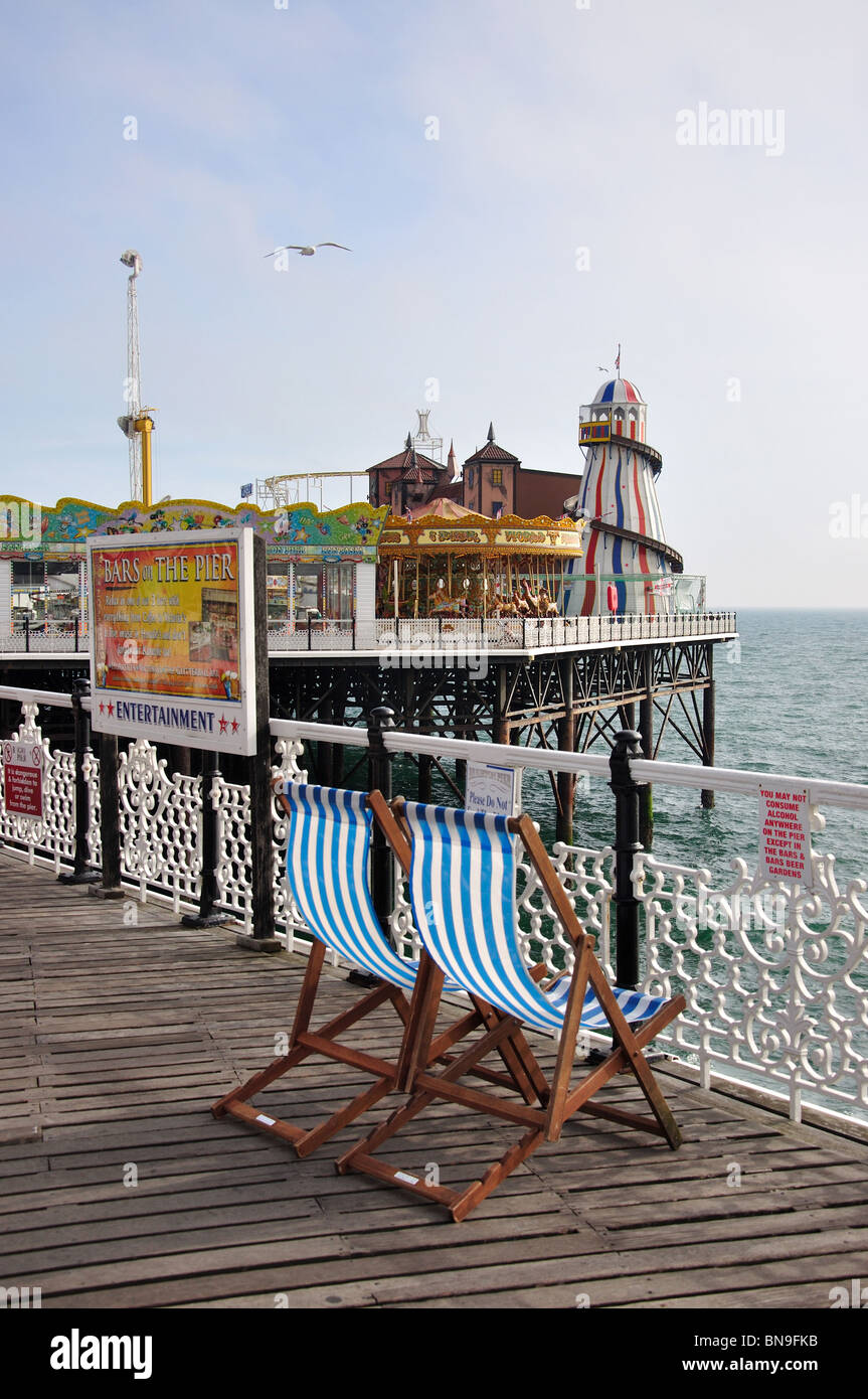 Deck chairs and fairground, Brighton Pier, Brighton, East Sussex ...