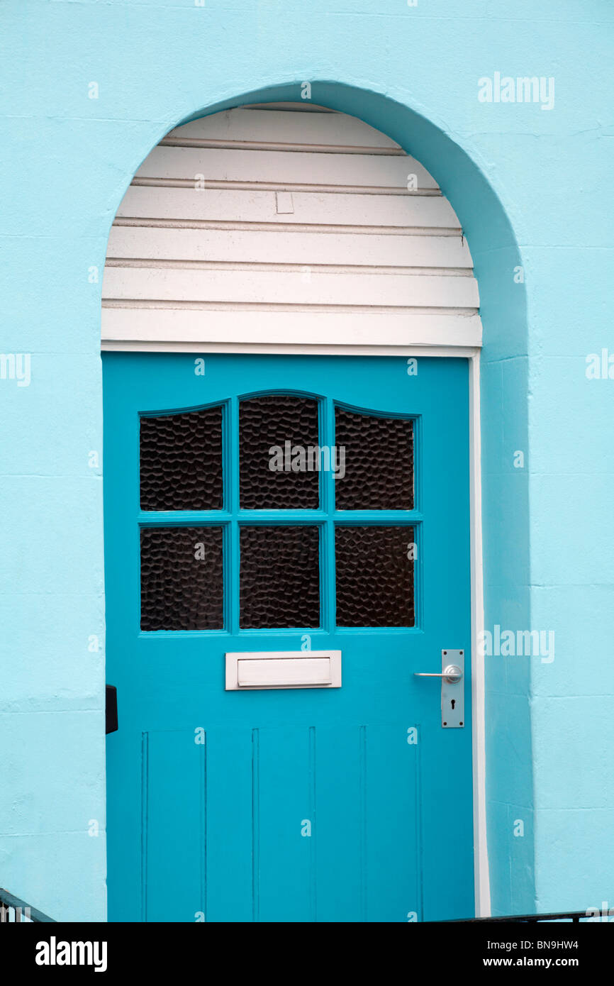 Turquoise blue door and wall of house Stock Photo - Alamy