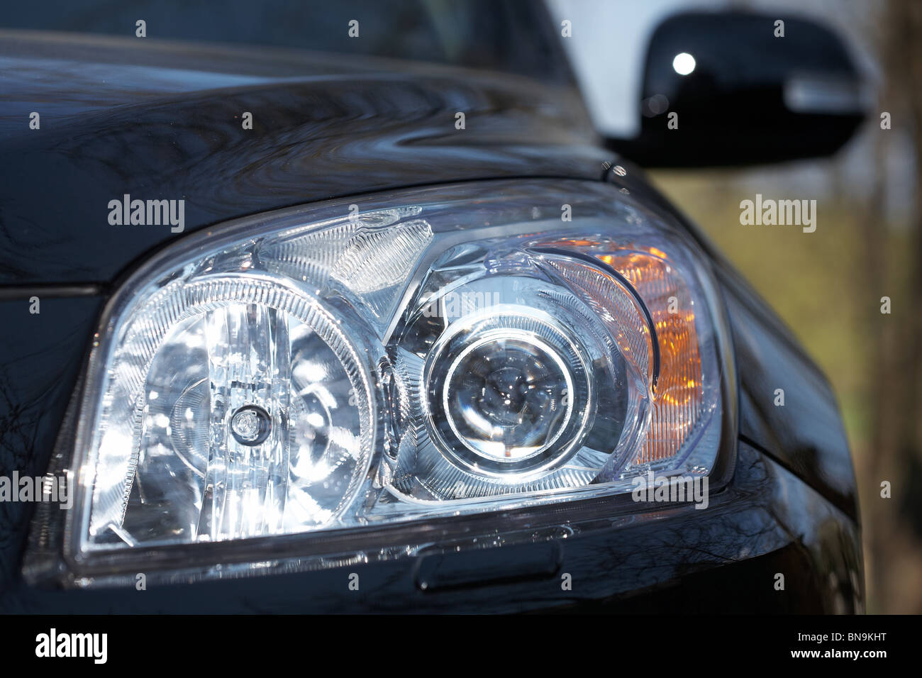 Closeup of car headlight - front view Stock Photo - Alamy
