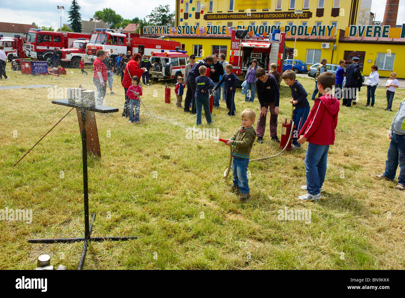 Young child boy playing fire fighter Stock Photo - Alamy