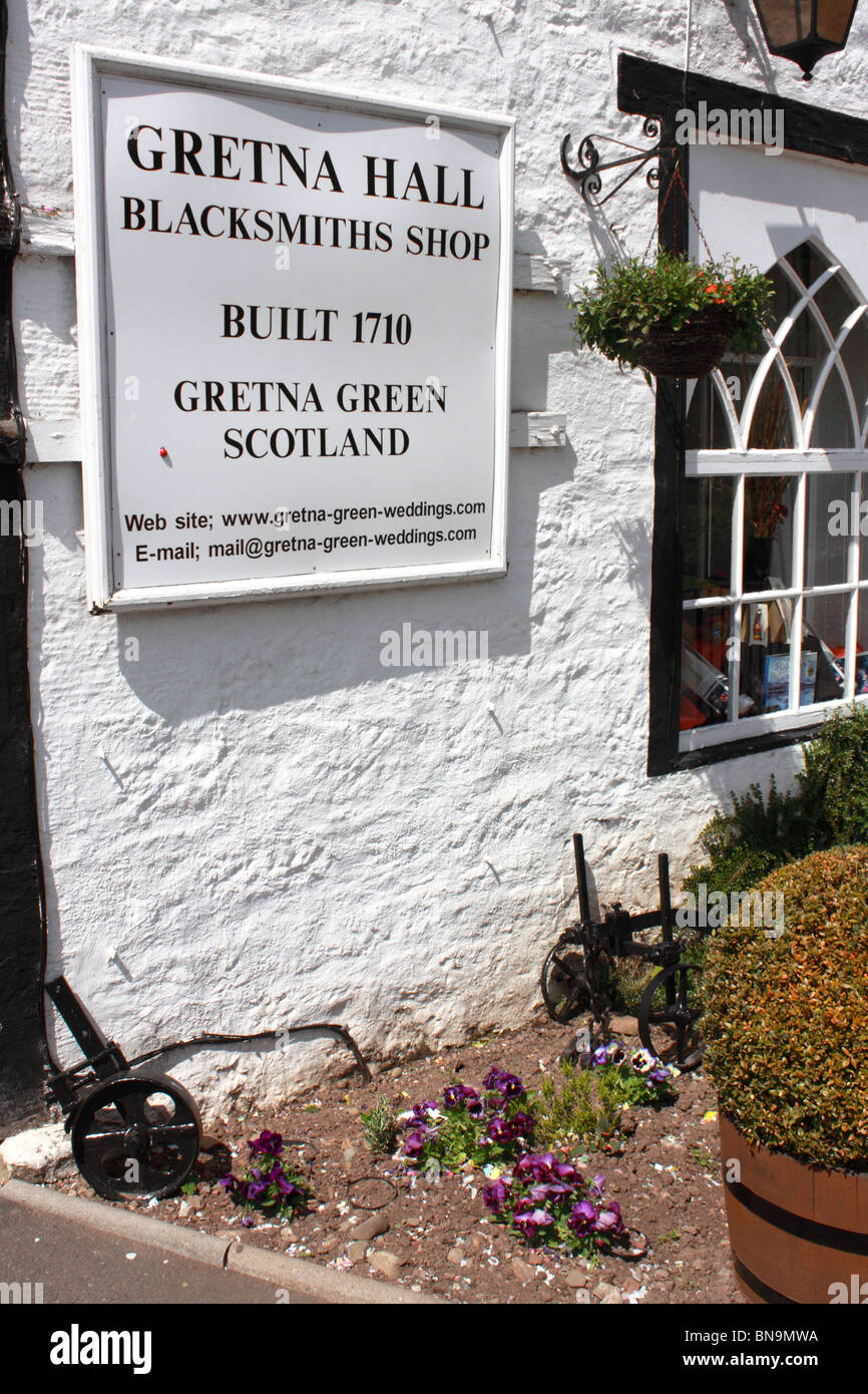 The Gretna Hall Blacksmith's shop in Gretna village, Scotland Stock ...