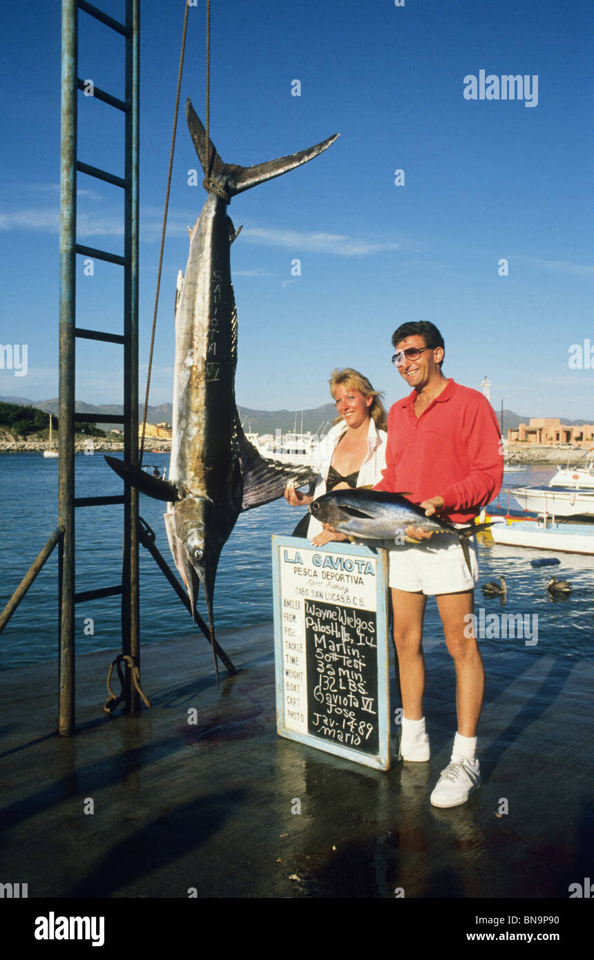 Mexico, Baja California, Cabo San Lucas, fisherman with catch, major ...