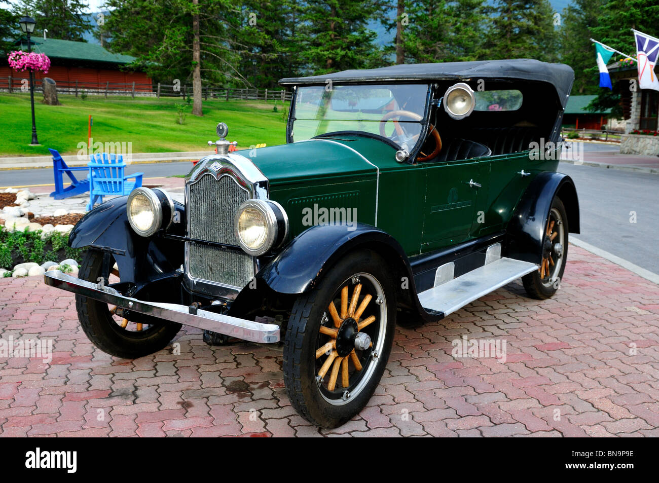 A vintage car parked in front of Fairmont Jasper Park Lodge Stock Photo ...