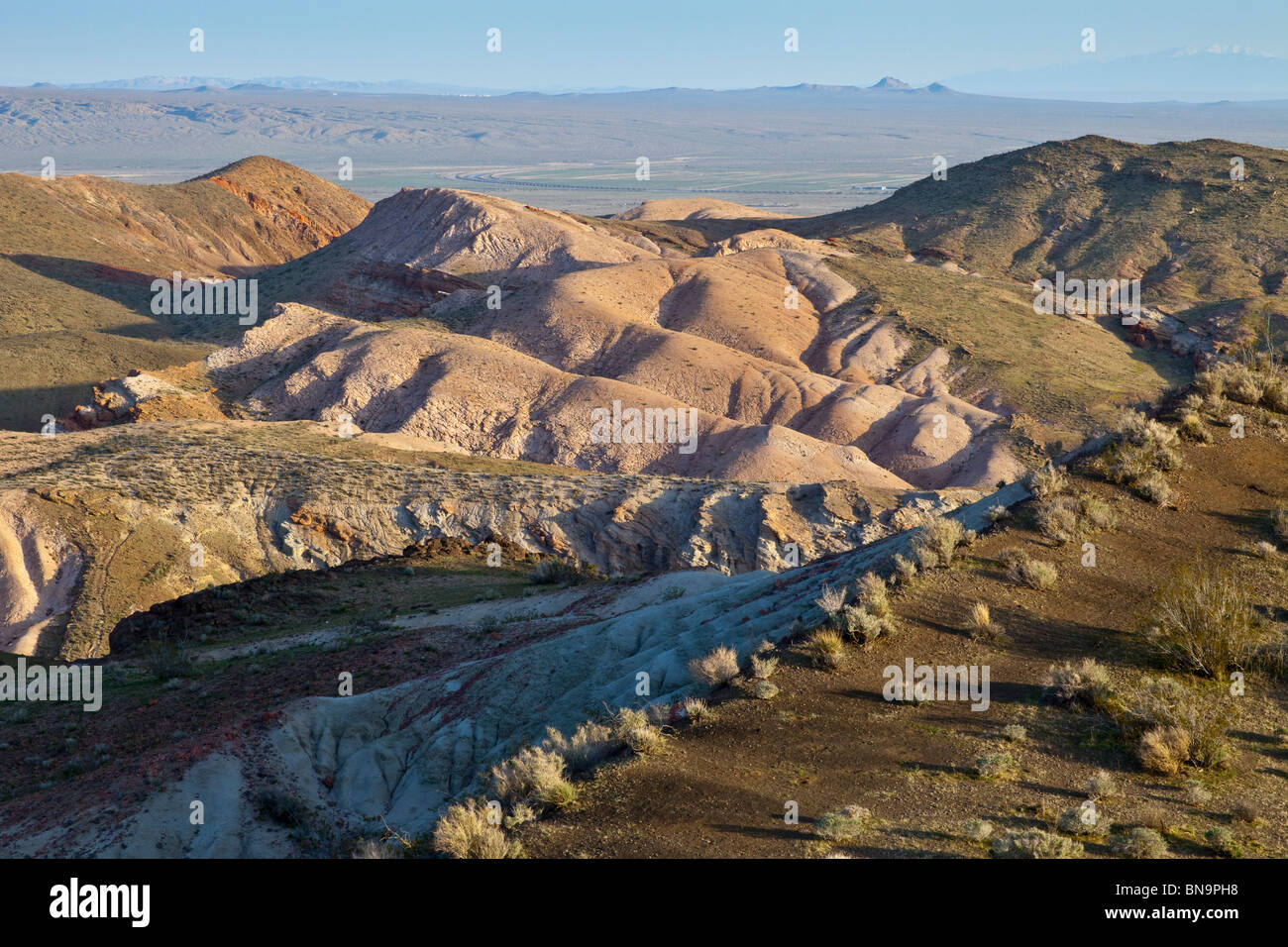 A view of the Mojave Desert from a cliff in Red Rocks Canyon State Park ...