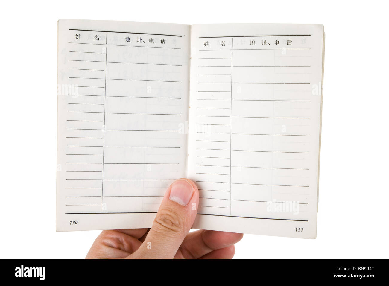 a Chinese Address book with white background close up Stock Photo - Alamy