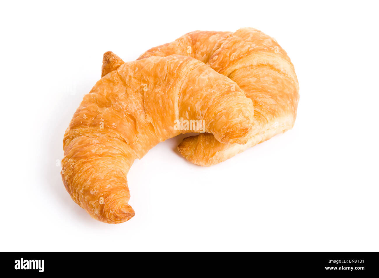 Yellow Croissant with white background Stock Photo - Alamy