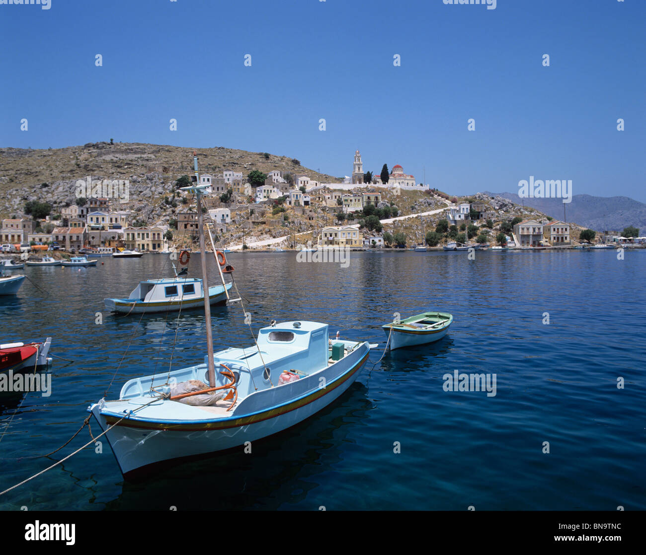Symi Town - View across the picturesque harbour Stock Photo - Alamy
