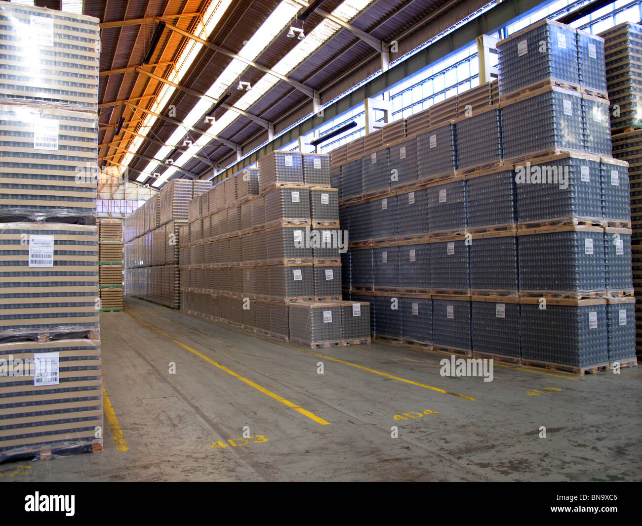 A warehouse full of glass products palletized ready for shipping Stock ...