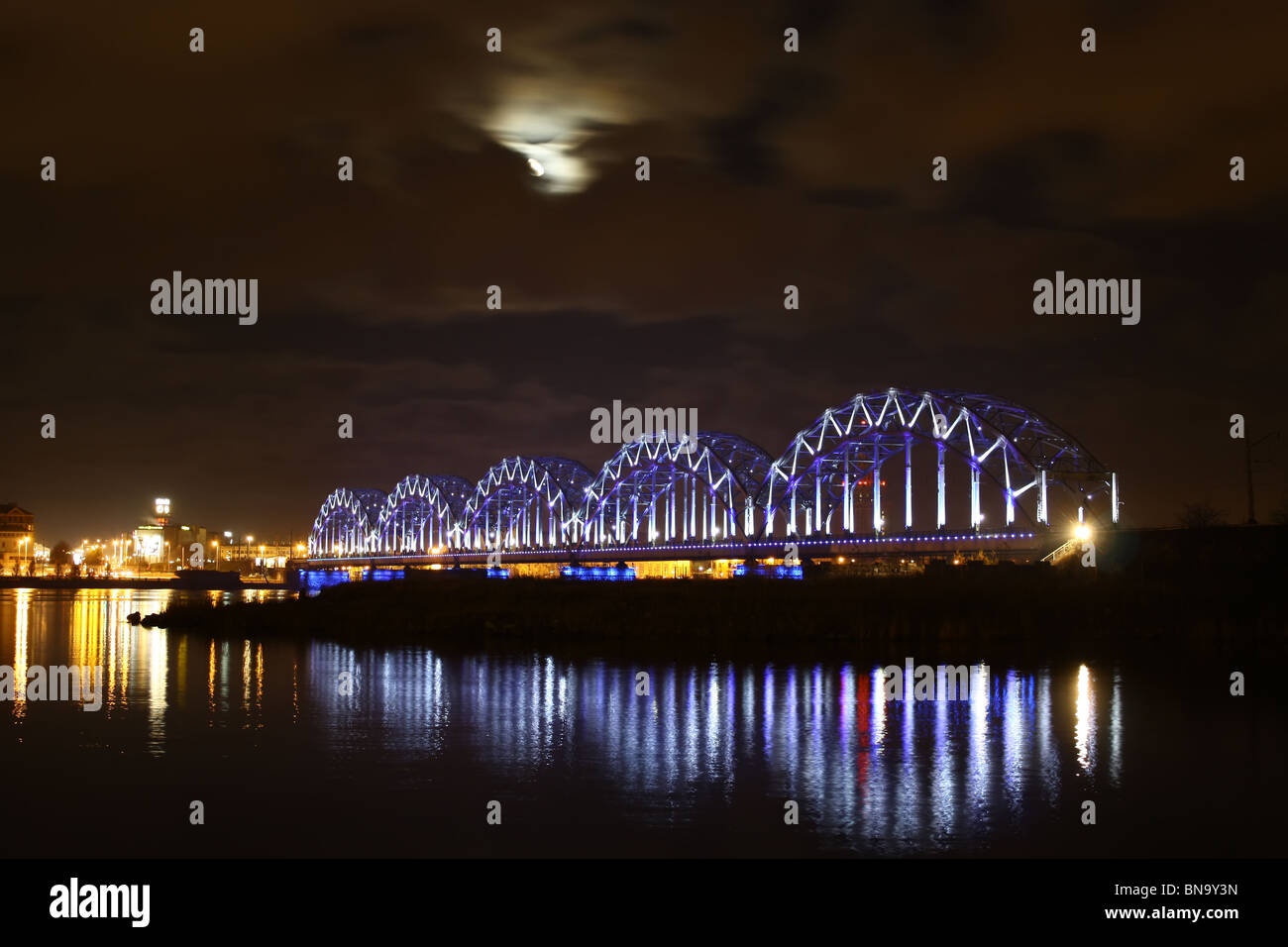 Night lighted bridge withh moon and river Stock Photo - Alamy