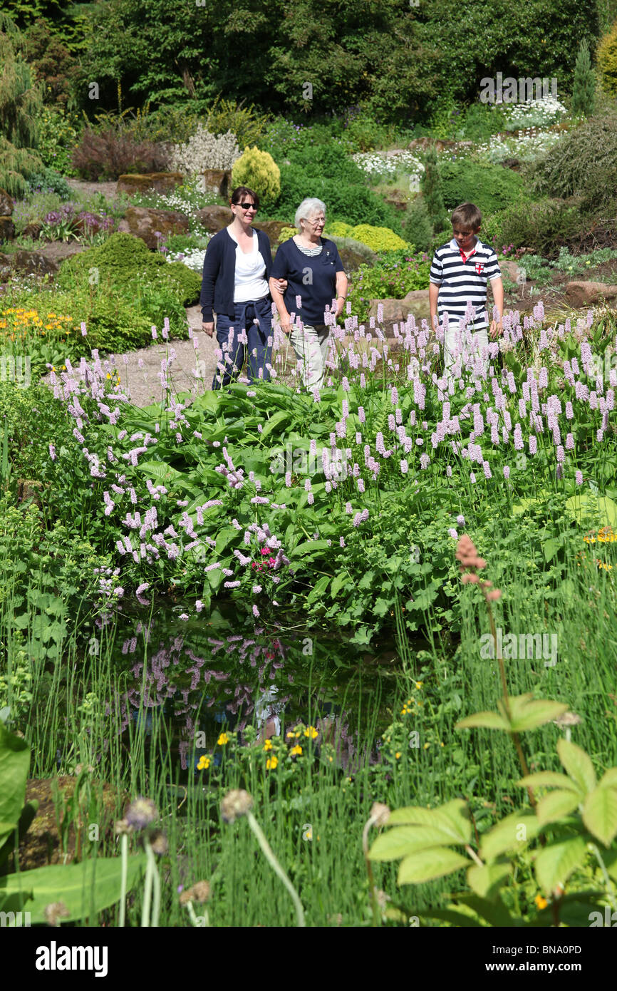 Ness Botanic Gardens, England. Picturesque spring view of visitors ...