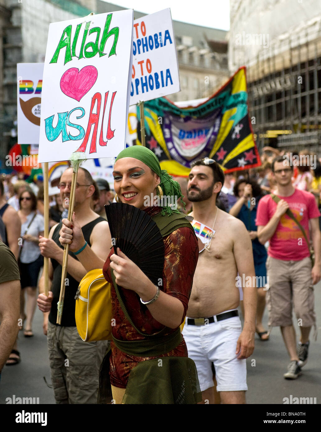 A Muslim carrying a placard during the Pride London celebrations Stock ...