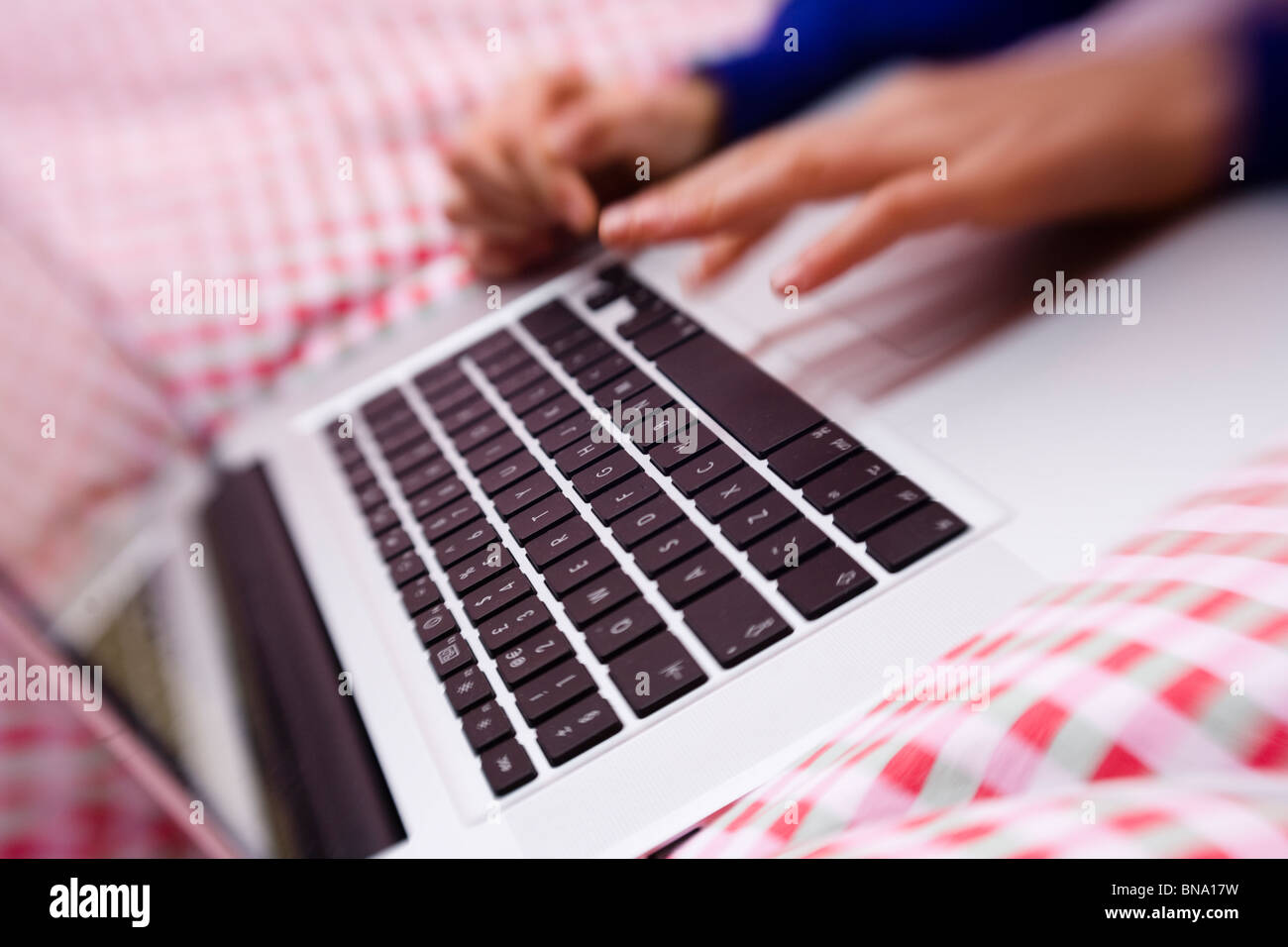 Child using laptop Stock Photo - Alamy