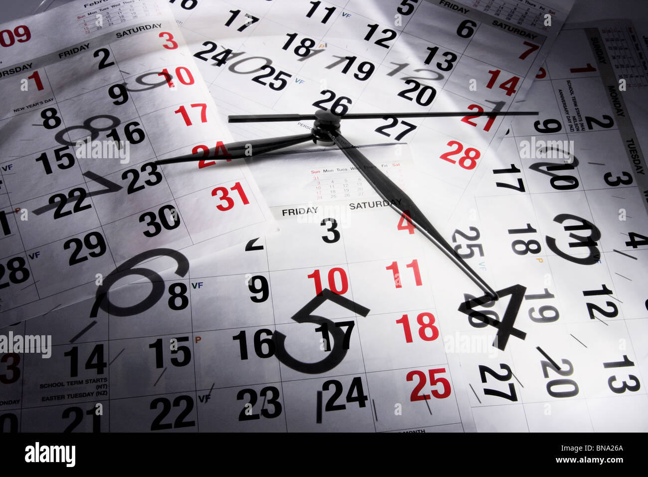 Clock and Pages of Calendar Stock Photo - Alamy