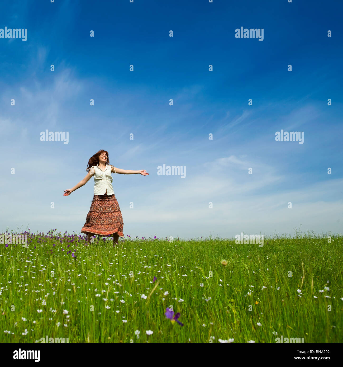 Woman dancing on lawn hi-res stock photography and images - Alamy