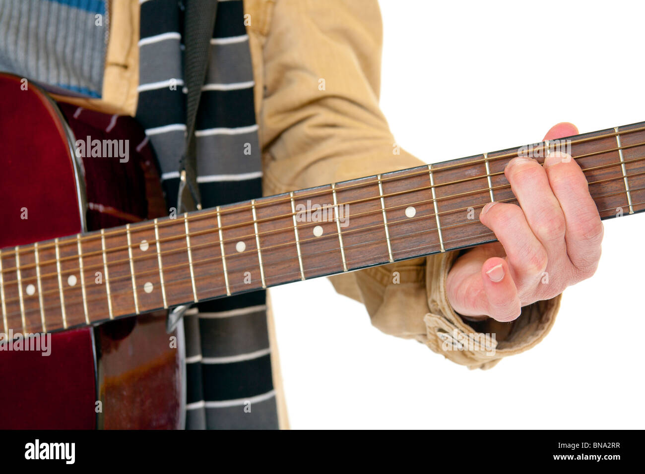 Closeup of hand playing a guitar Stock Photo - Alamy