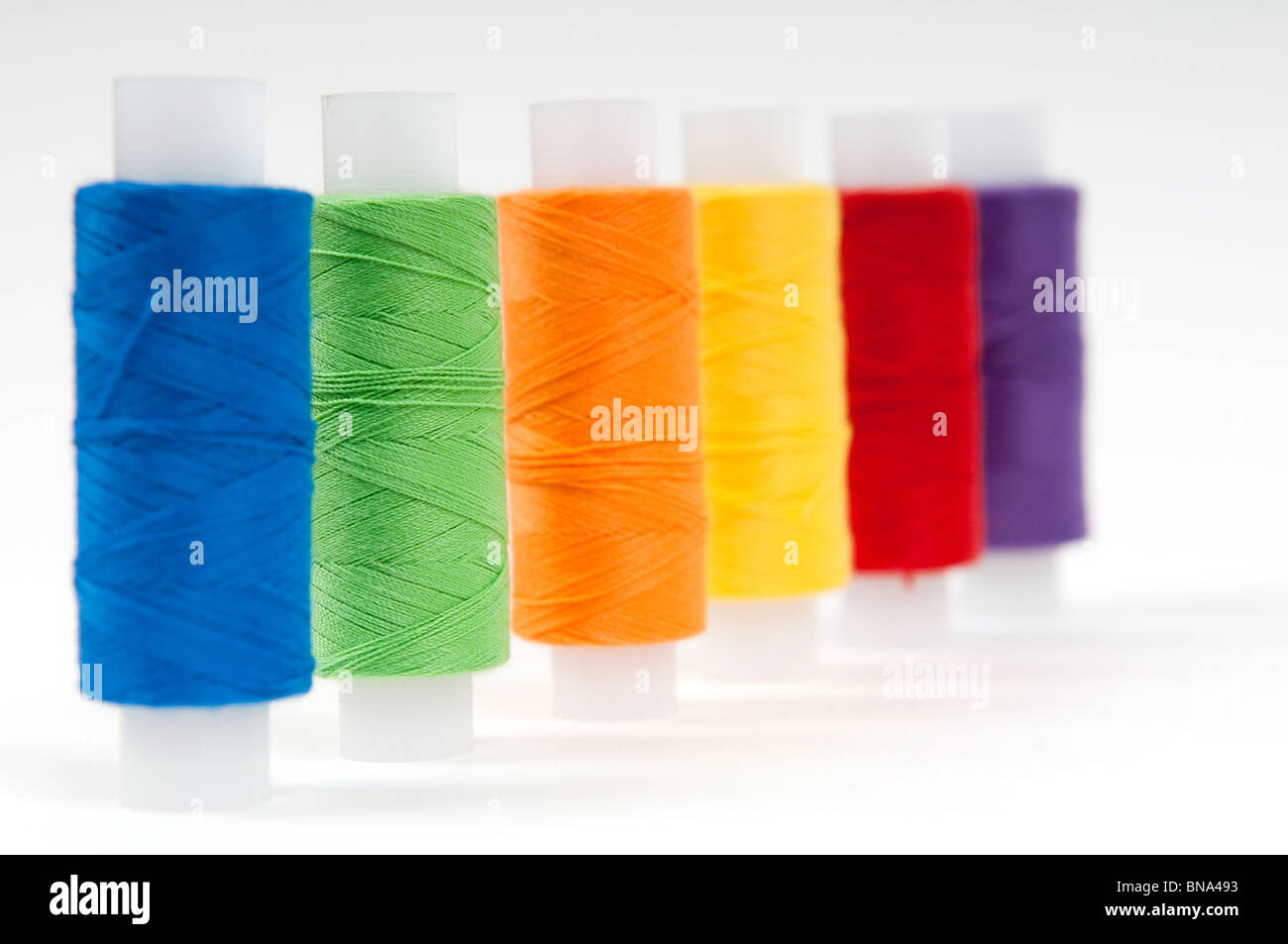 Set of sewing threads on white backgrounds Stock Photo - Alamy