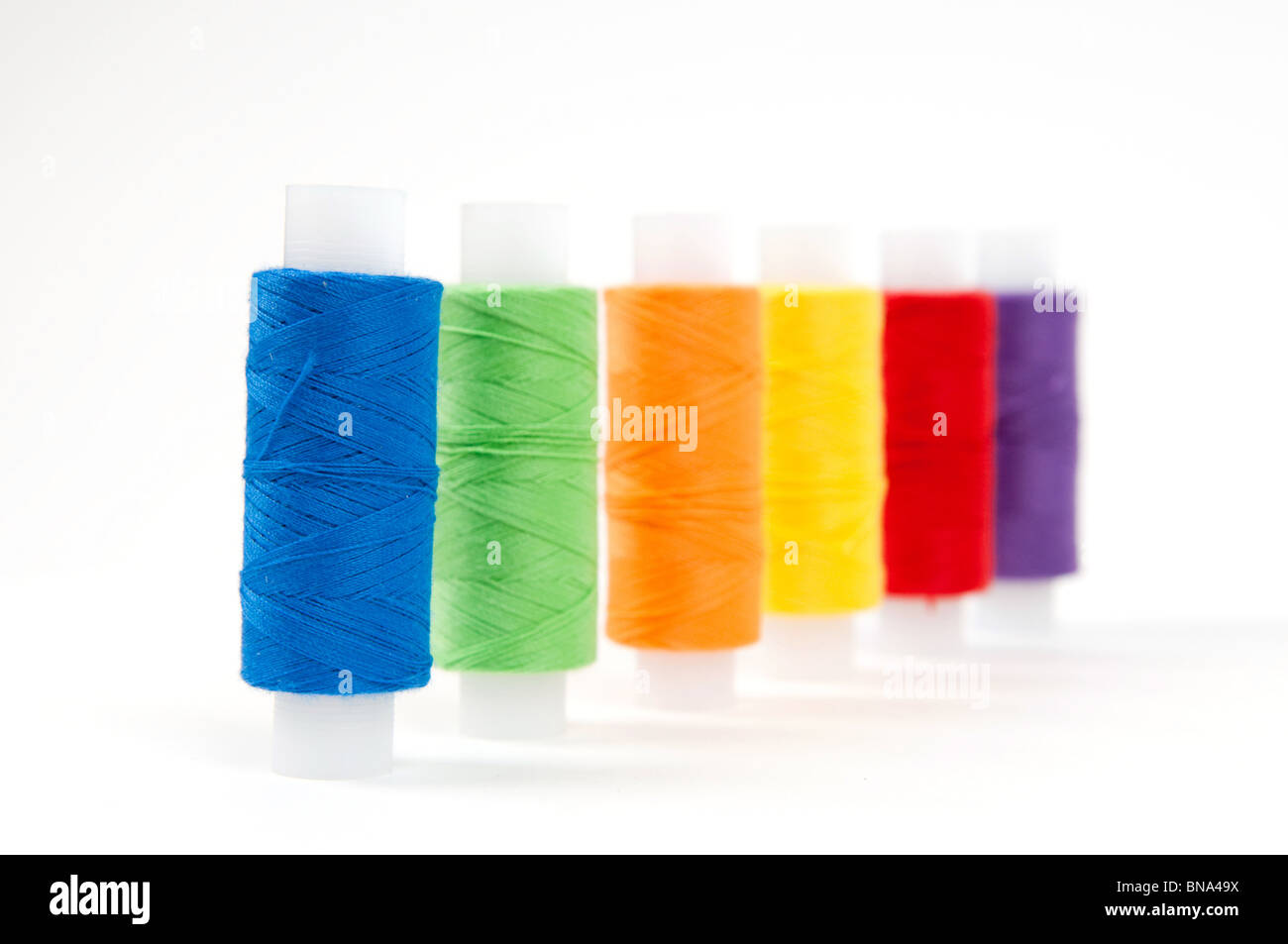 Set of sewing threads on white backgrounds Stock Photo - Alamy