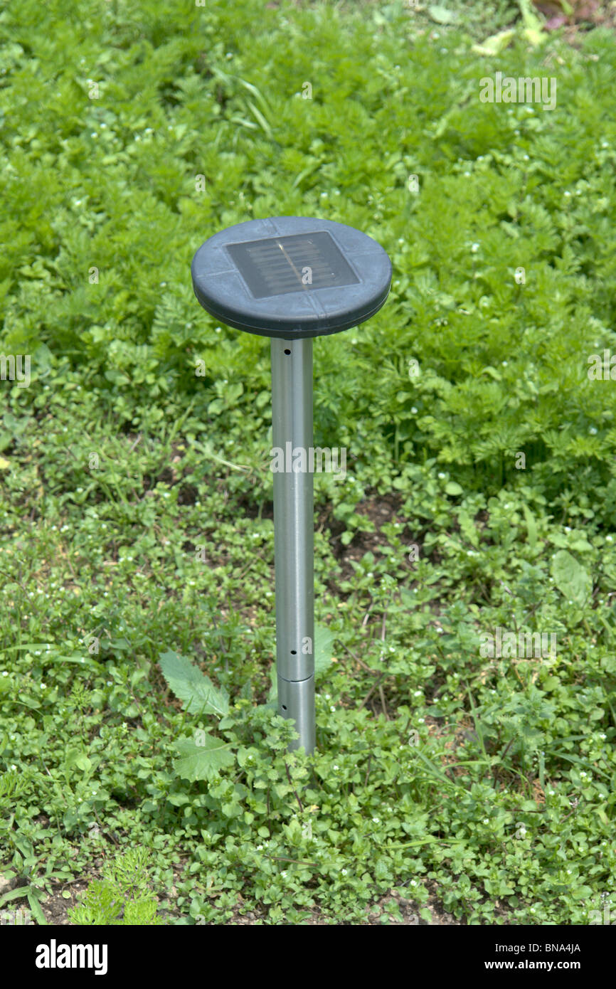 Solar-powered mole chaser Stock Photo - Alamy