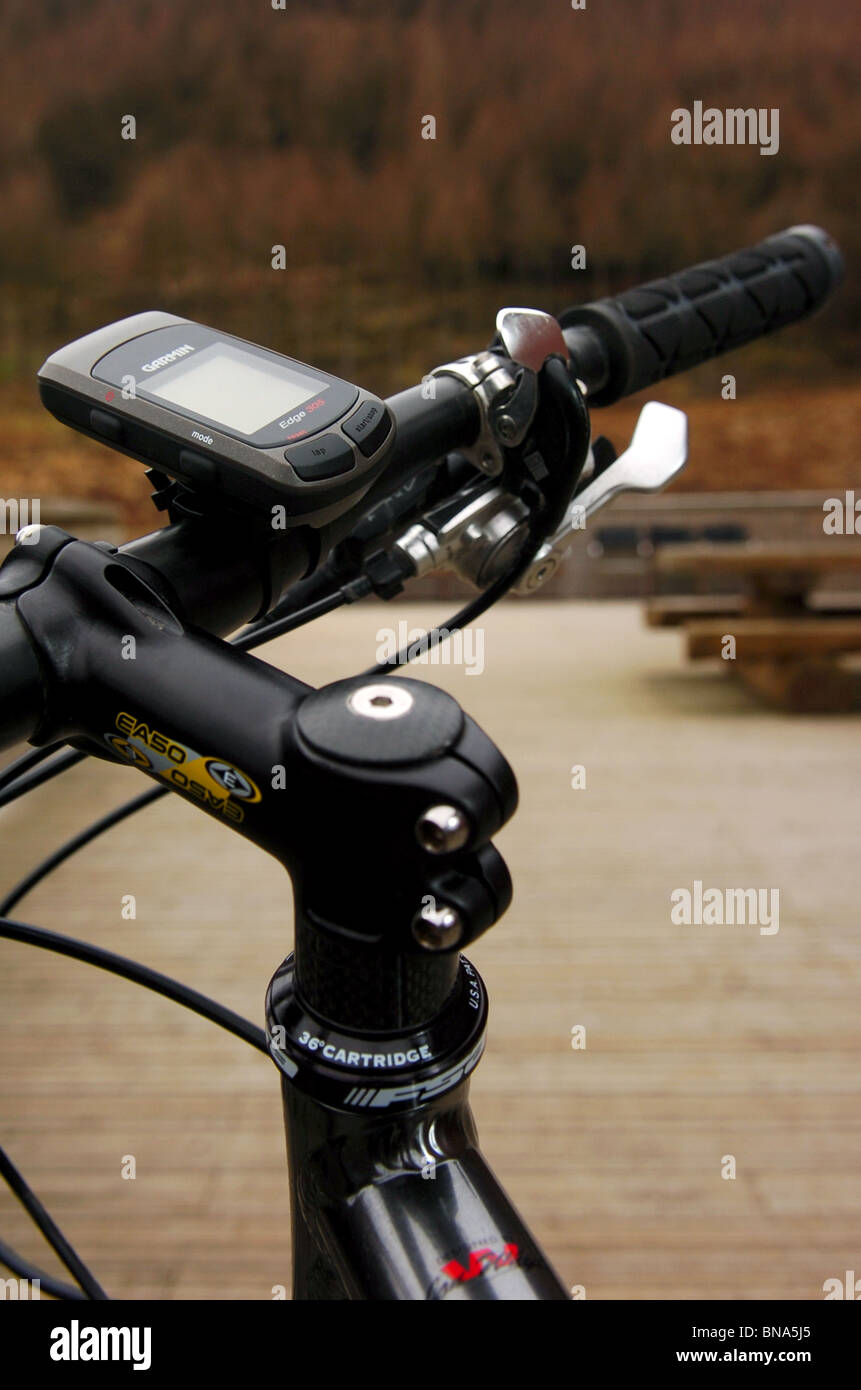 A global positioning (GPS) system mounted on the handlebar of a ...