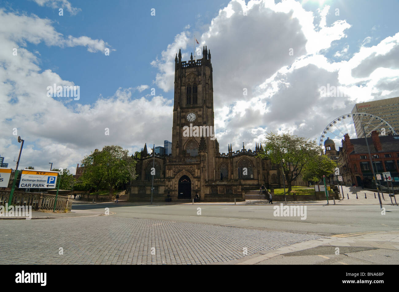 Manchester Cathedral West Door and clock tower Stock Photo - Alamy