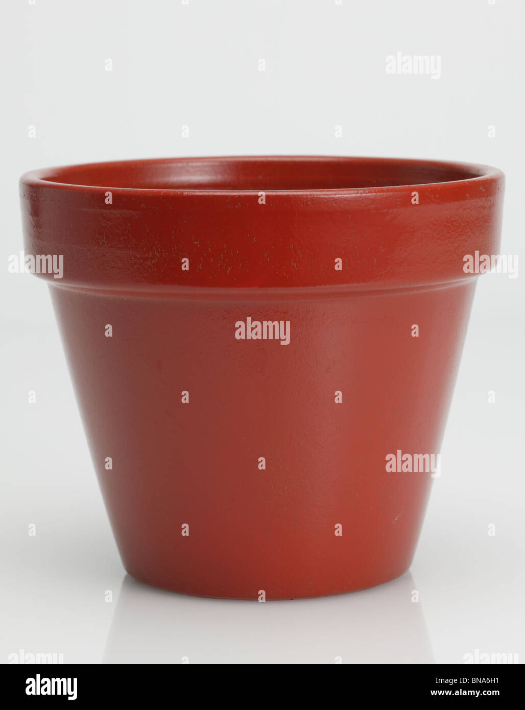 red plant pot on white background Stock Photo - Alamy