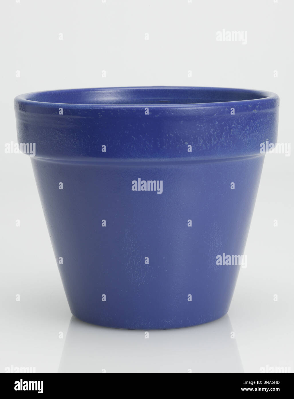 blue painted plant pot Stock Photo - Alamy