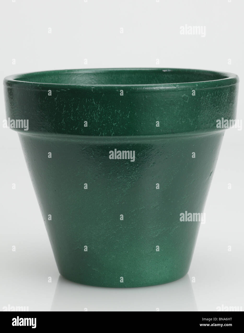 green painted plant pot Stock Photo - Alamy