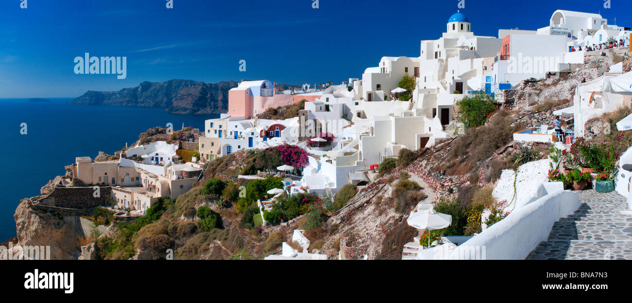 The pictures town of Oia is build on top of the caldera at the northern ...