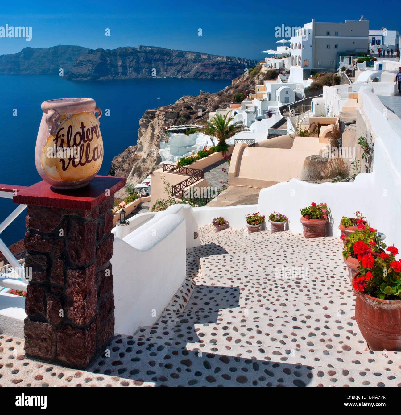 The pictures town of Oia is build on top of the caldera at the northern ...