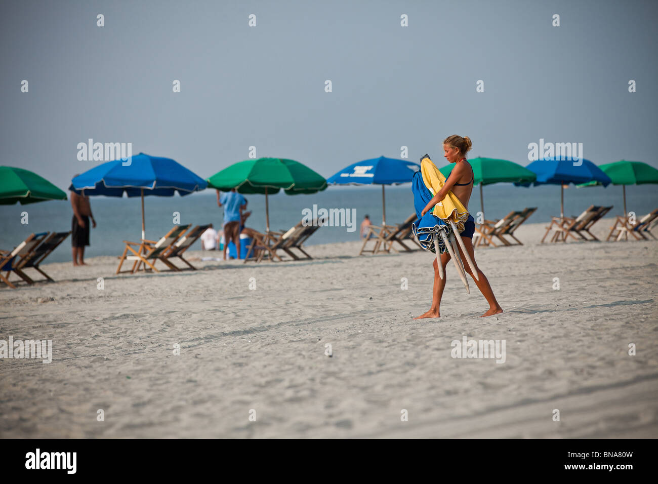 Lifeguards set up Beach umbrellas on the beach in Myrtle Beach, SC ...