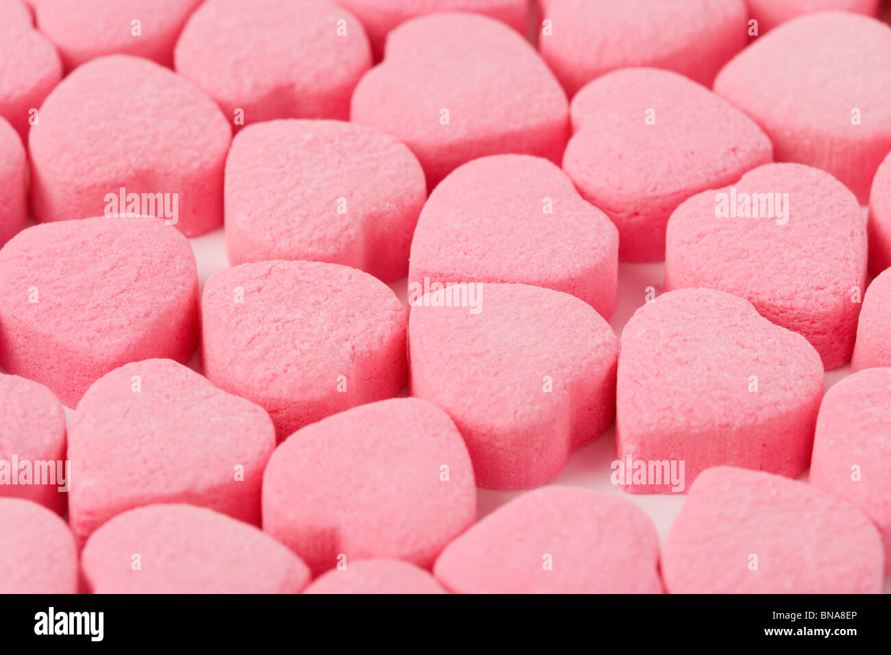 Pink Heart Shape Candy close up Stock Photo - Alamy