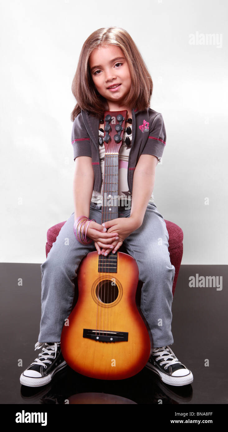 Young girl and her guitar Stock Photo - Alamy