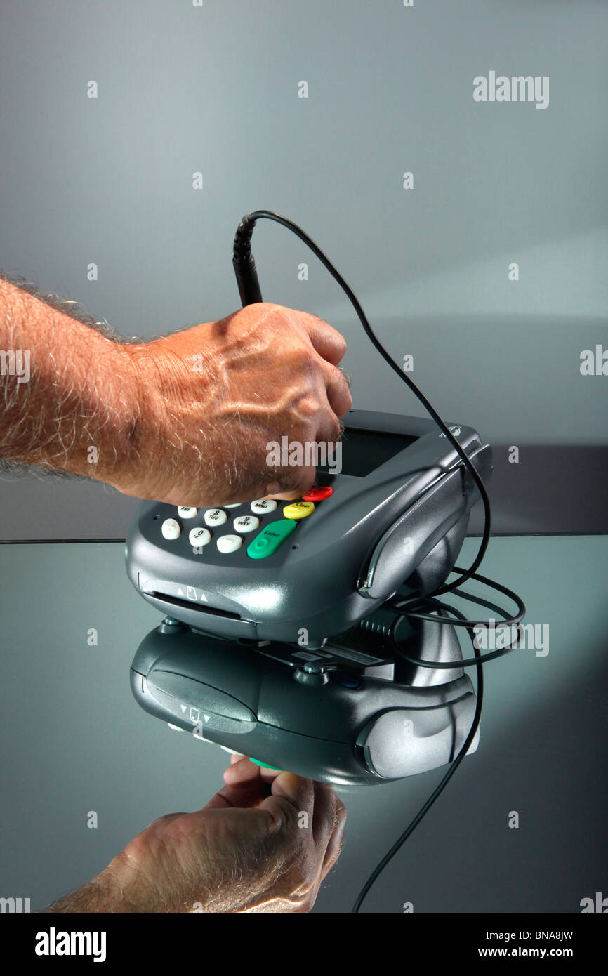 Swipe and Sign Point of Sale card reader Stock Photo - Alamy