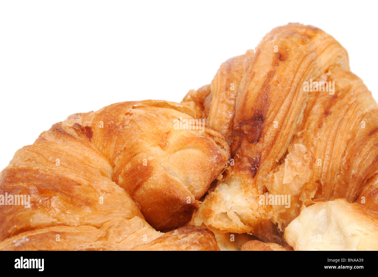 closeup of some croissants on a white background Stock Photo - Alamy