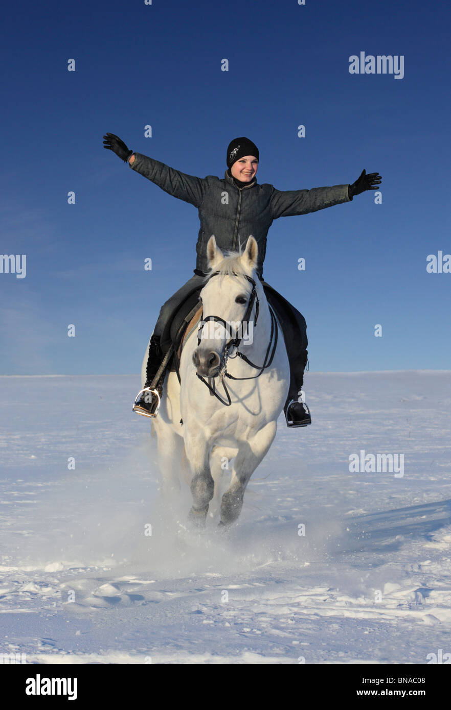 Woman Riding Horse Snow Running High Resolution Stock Photography and ...
