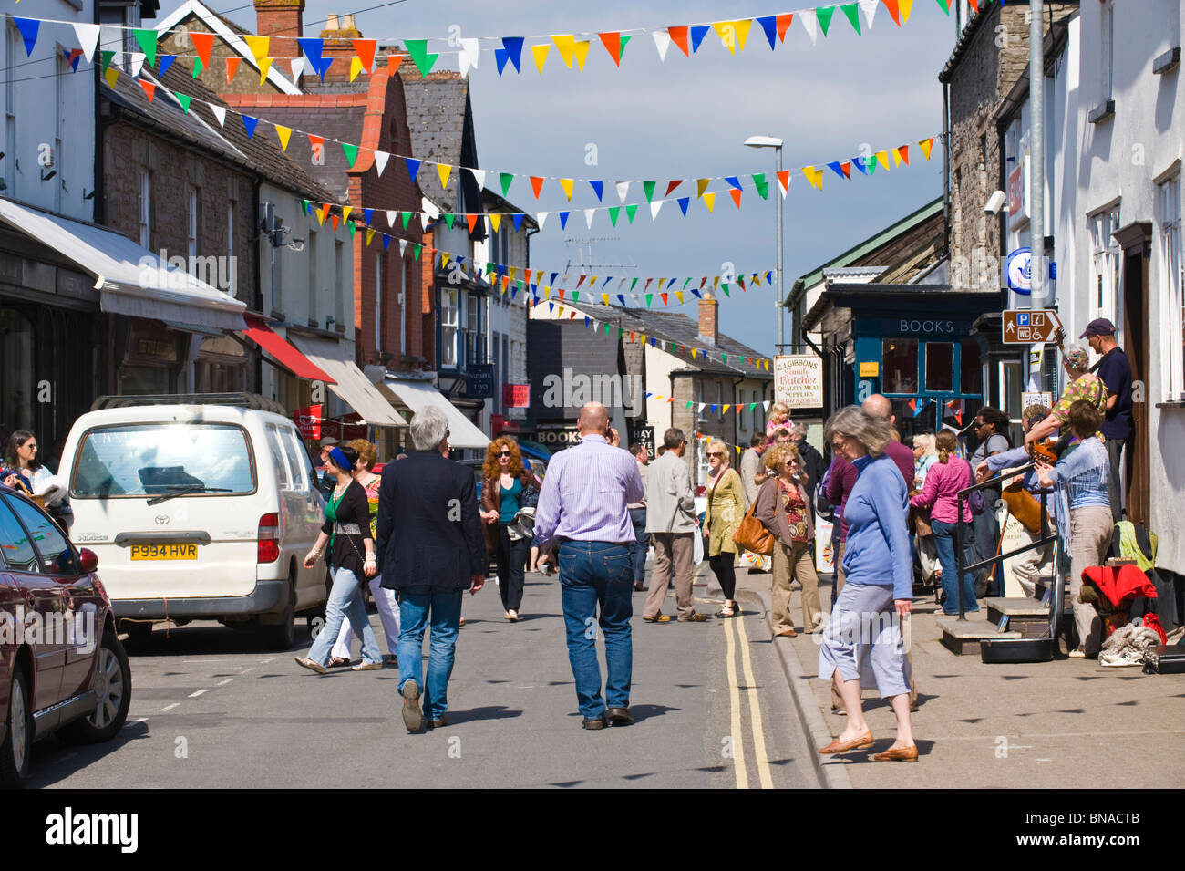 Hay town centre decorated with bunting and busy with tourists during ...
