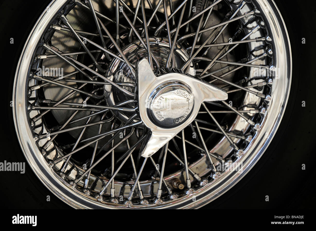 Spoked wheel of Aston Martin DB5 sports car Stock Photo - Alamy